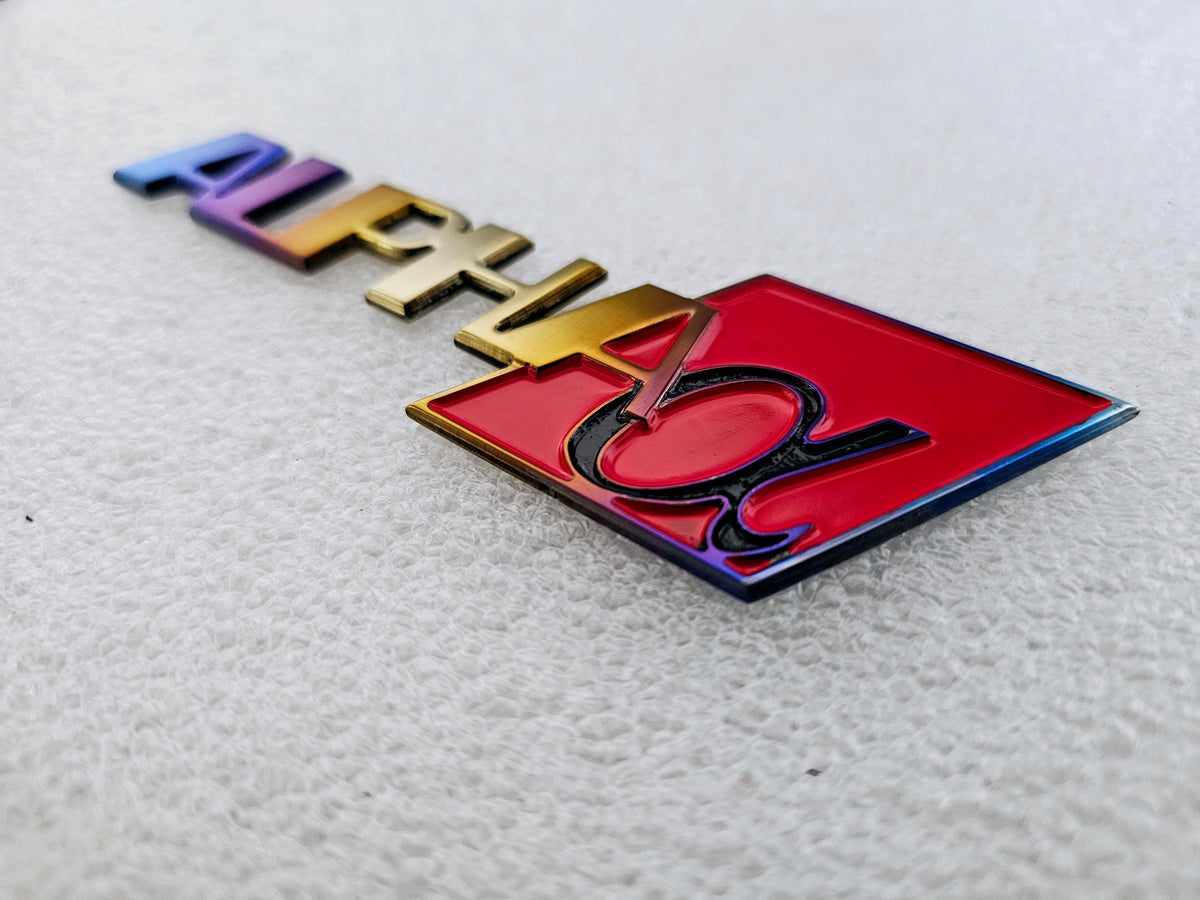 AMS Alpha Titanium emblem – Titanium Works